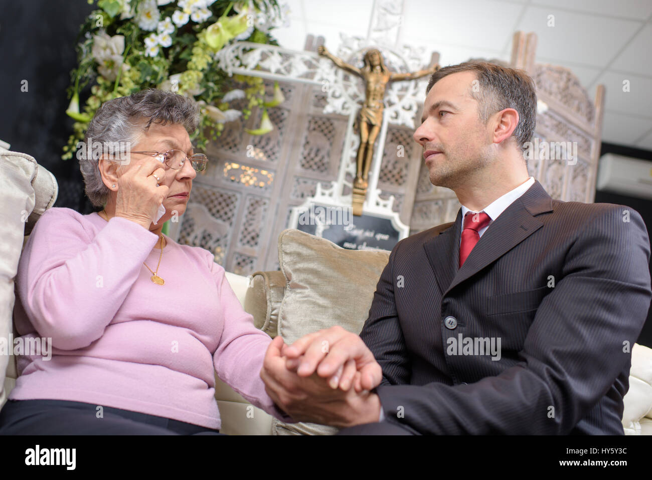 Elderly woman crying man hi-res stock photography and images - Alamy