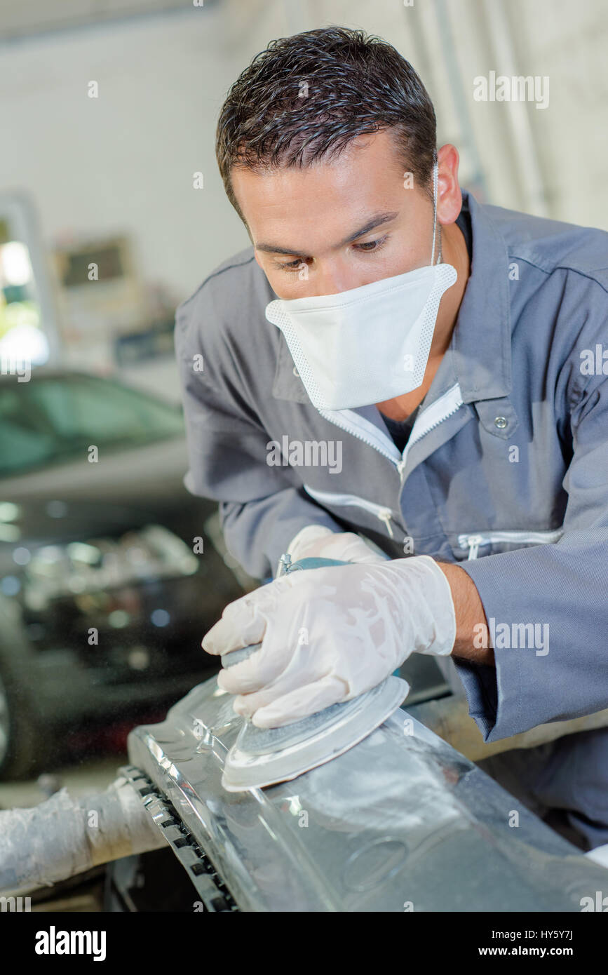 worker in car body workshop Stock Photo - Alamy