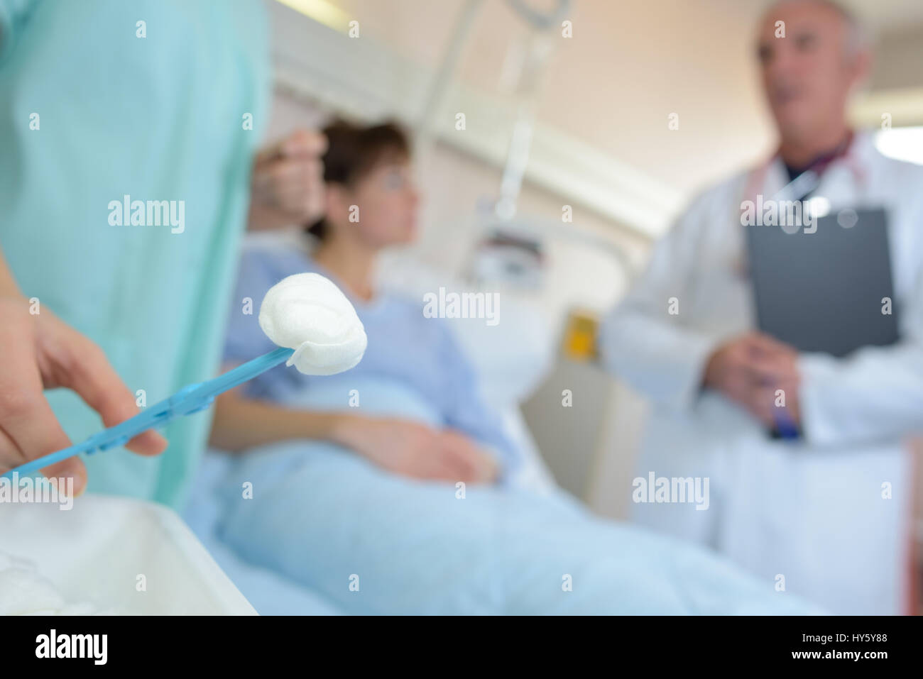 nurse changing a dressing Stock Photo - Alamy