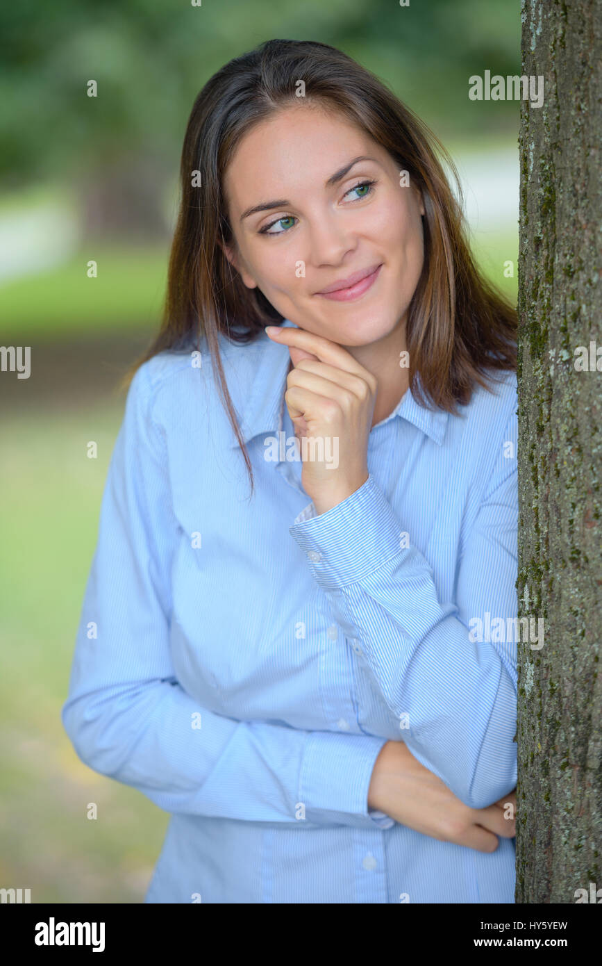 woman behind a tree Stock Photo - Alamy