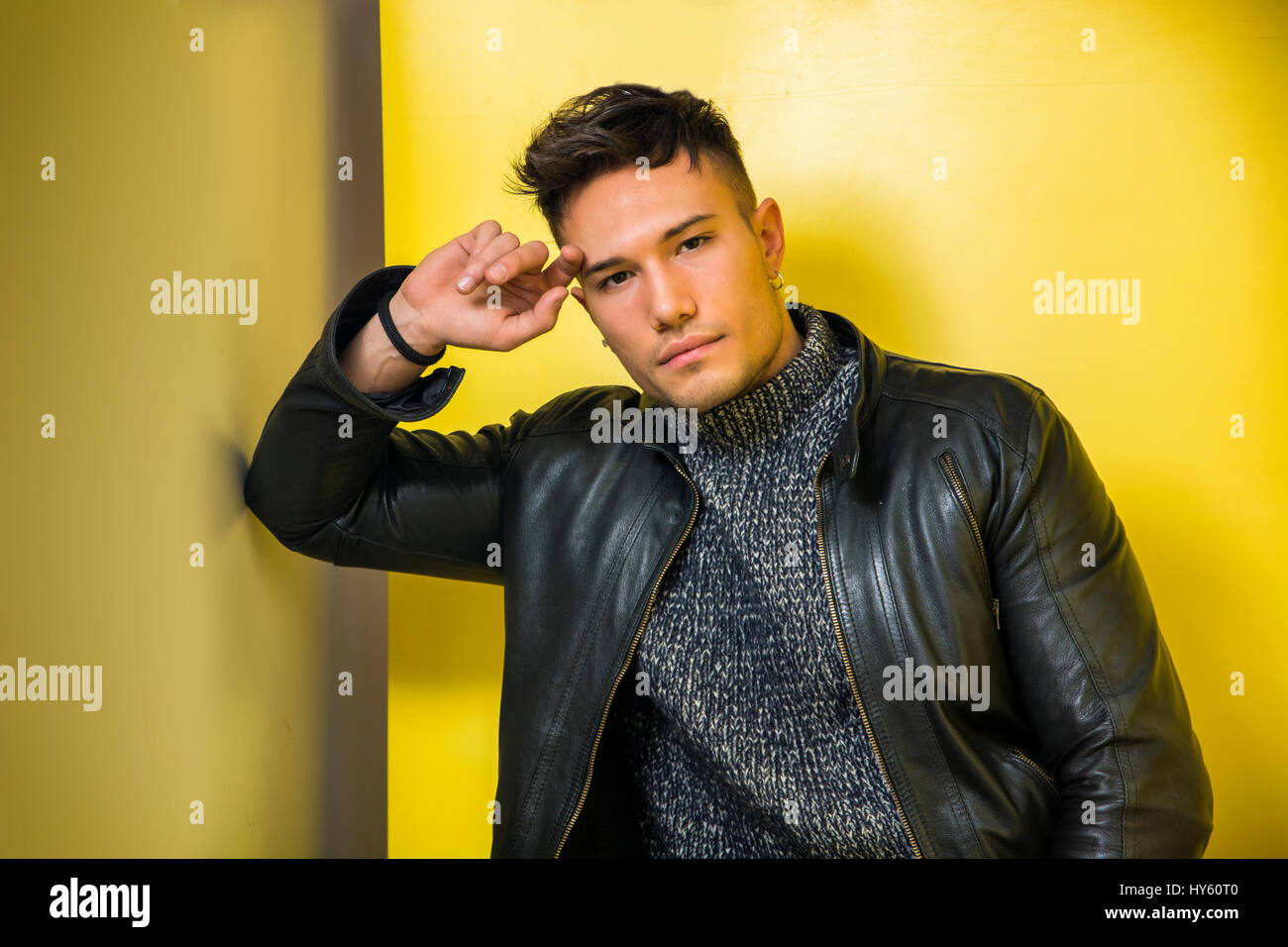 Handsome asian-white young man in black leather jacket Stock Photo - Alamy