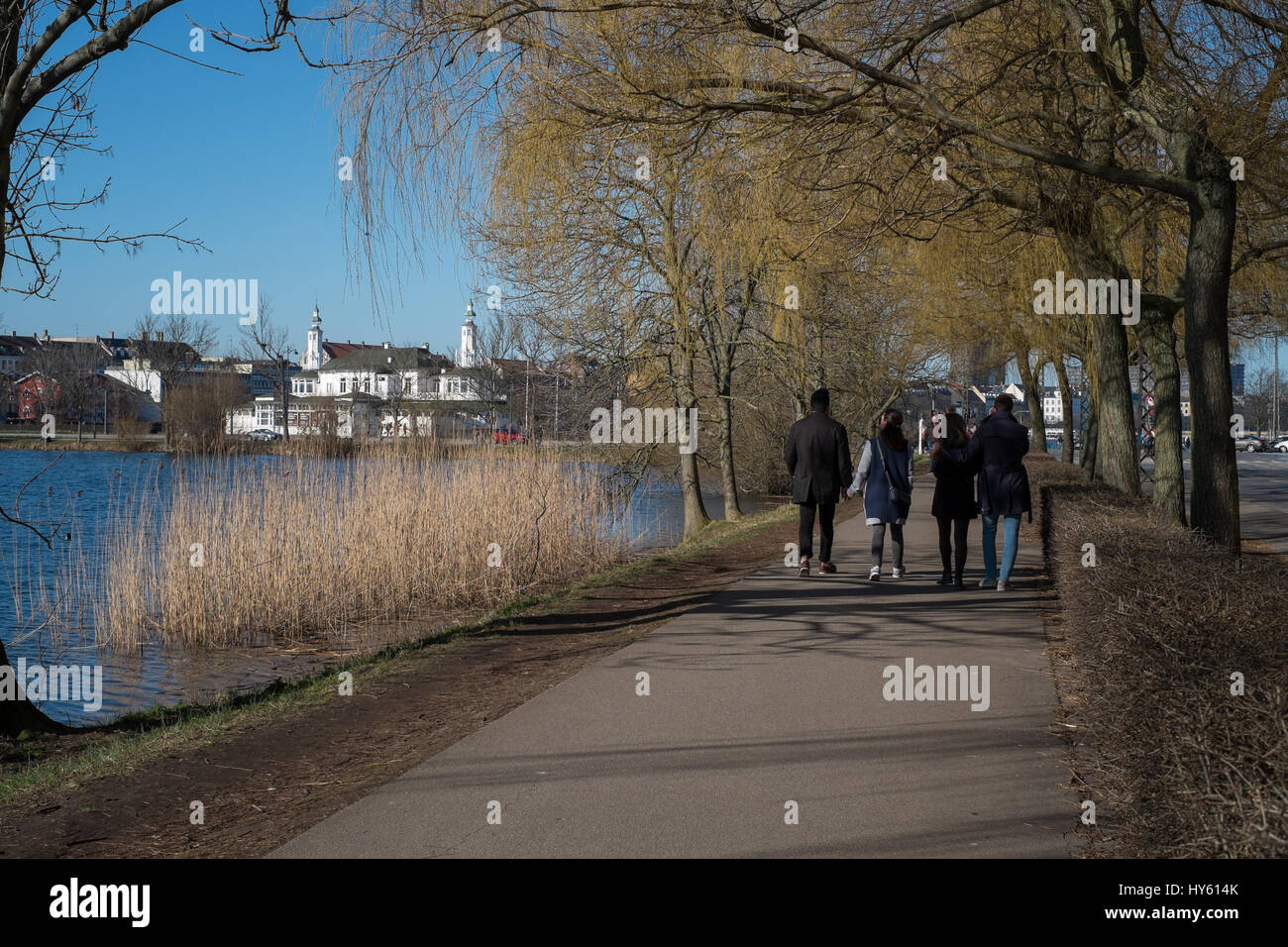 Walkers enjoying spring sun at The Lakes, Copenhagen, Denmark Stock ...