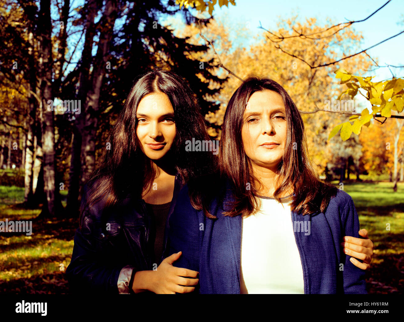 mature real mother with daughter outside autumn fall in park Stock ...