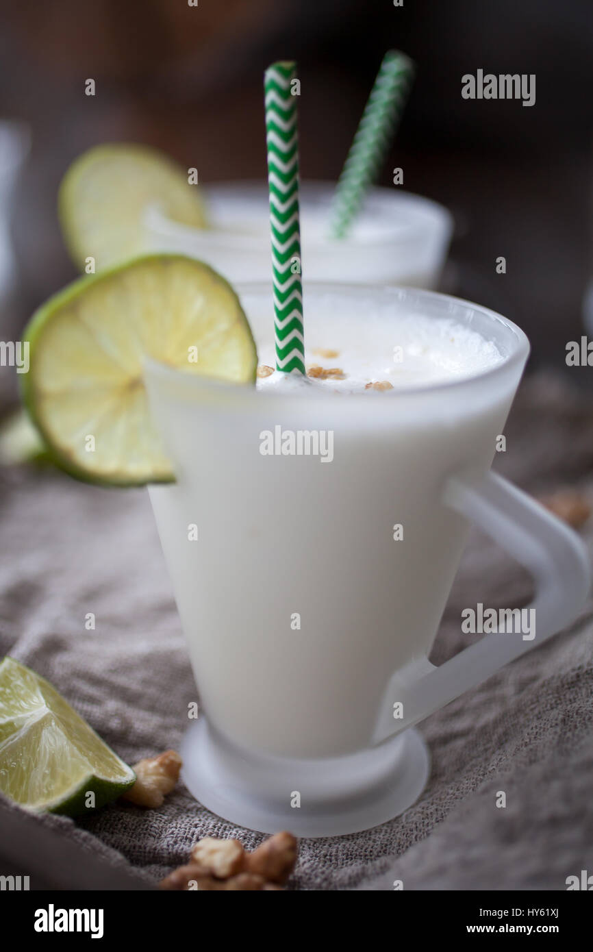 Lime milk shake for two Stock Photo - Alamy