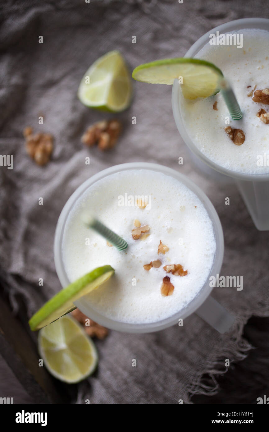 Lime milk shake for two Stock Photo - Alamy