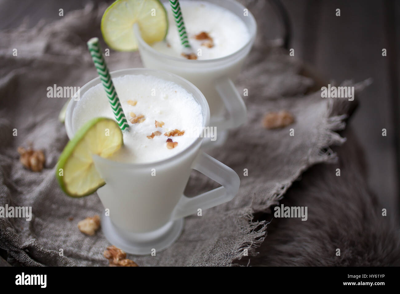 Lime milk shake for two Stock Photo - Alamy