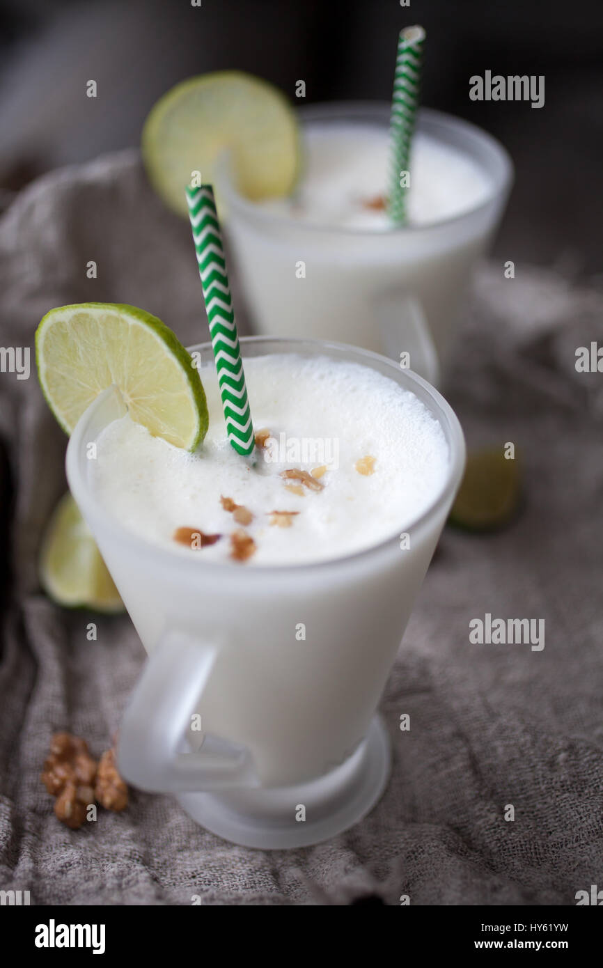 Lime milk shake for two Stock Photo - Alamy