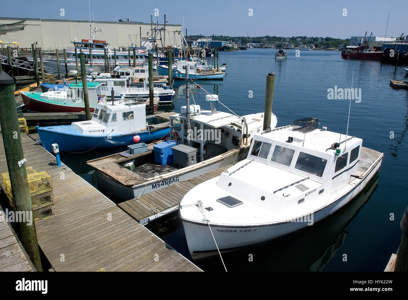 Along the waterfront of Gloucester Harbor, Massachusetts Stock Photo ...