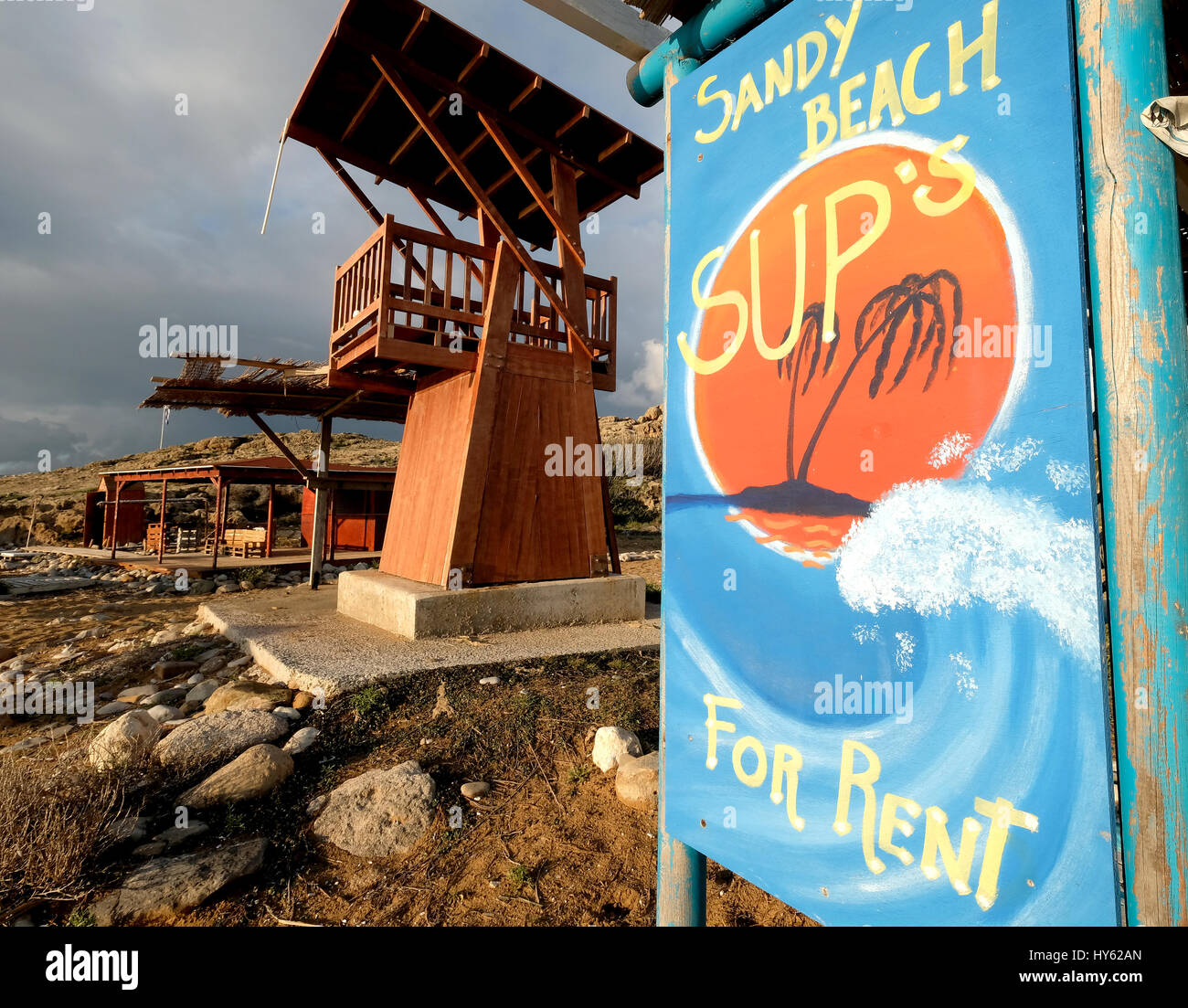 Lifeguard post and beach brollies at Sandy beach in Paphos Cyprus Stock ...