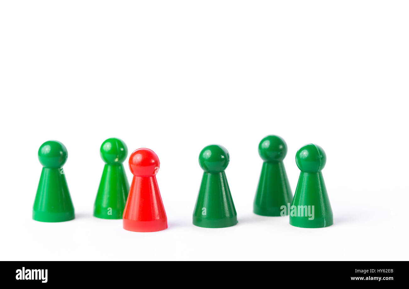 A unique red token between green tokens Stock Photo - Alamy