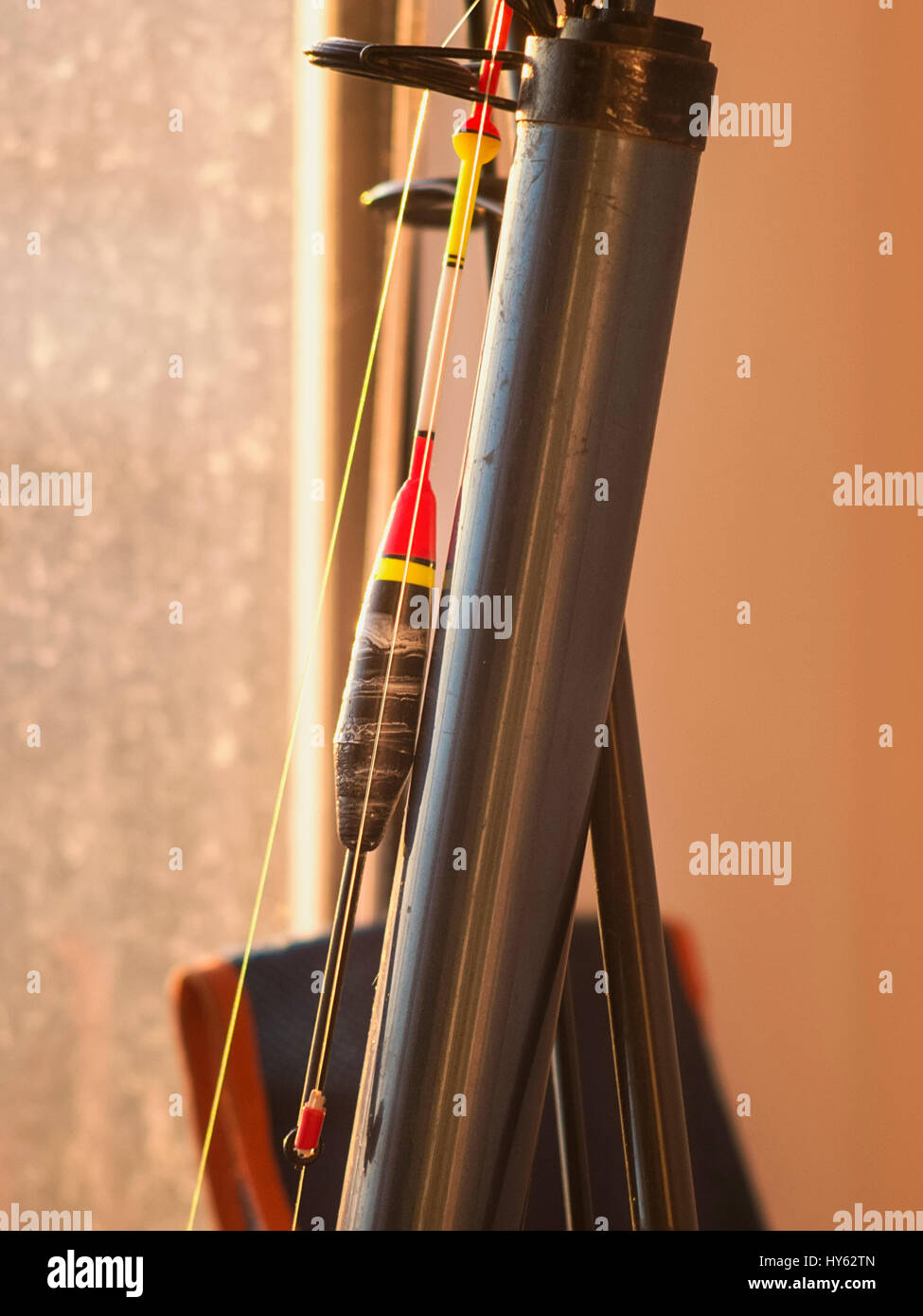 An interesting float, fishing rod and fishing reel Stock Photo - Alamy
