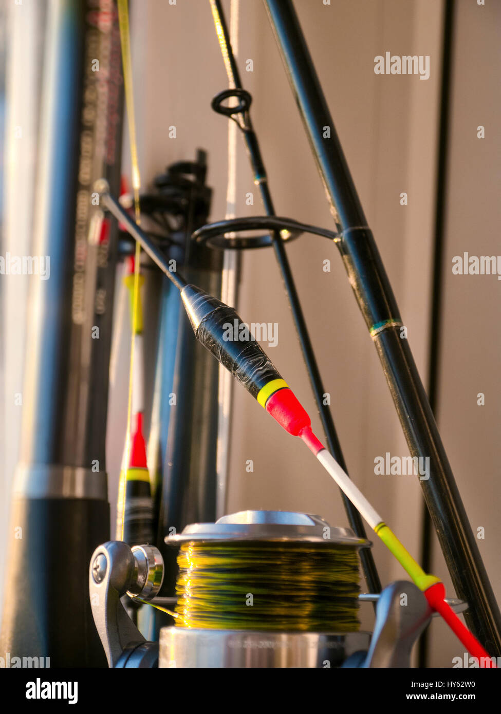 The float, fishing rod and fishing reel close-up Stock Photo - Alamy