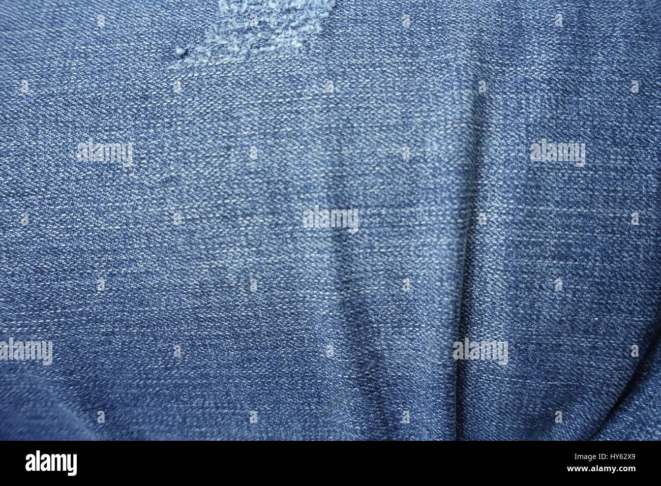 frayed jeans texture for background blue jeans close up Stock Photo - Alamy