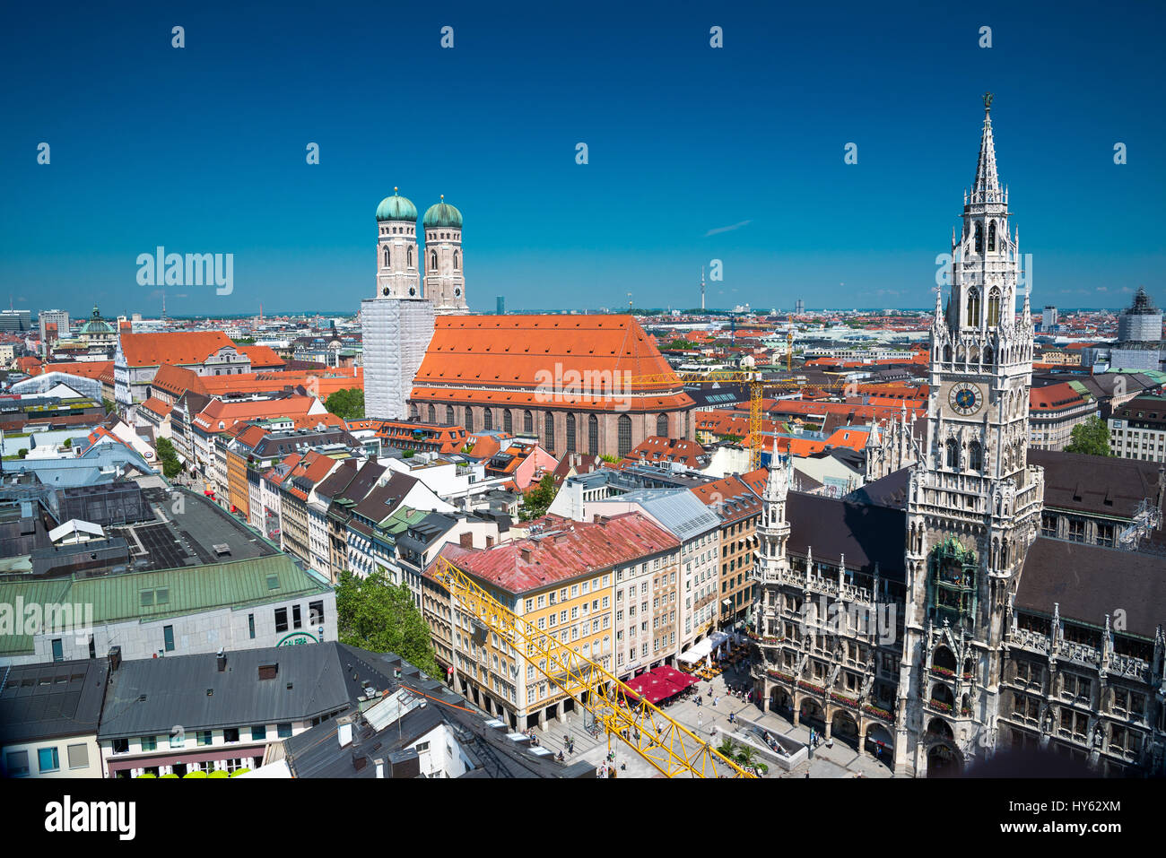 Munich, Germany - June 7, 2016: City view with sky, Frauenkirche, red ...