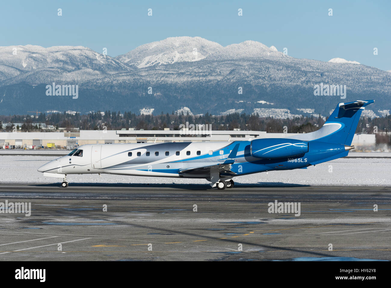 2008 EMBRAER EMB-135BJ fixed wing aircraft taxiing on YVR tarmac Stock ...