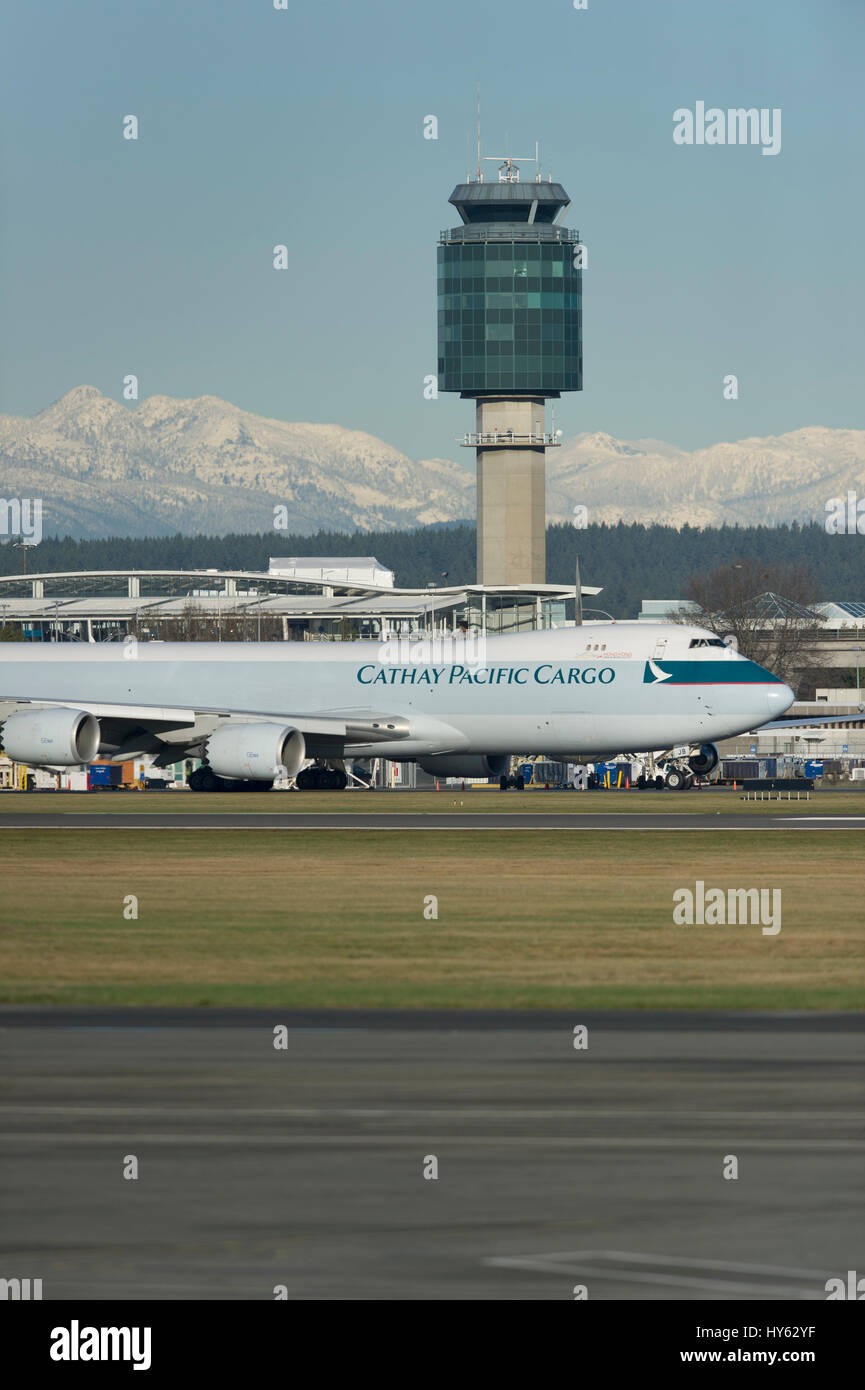 Cathay Pacific Cargo Boeing 747 taxiing in front of YVR control tower ...