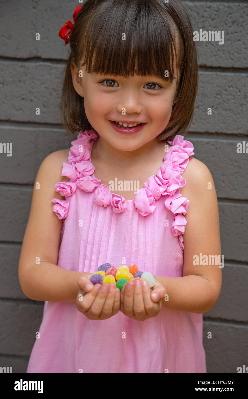 Pretty girl holding soft hi-res stock photography and images - Alamy