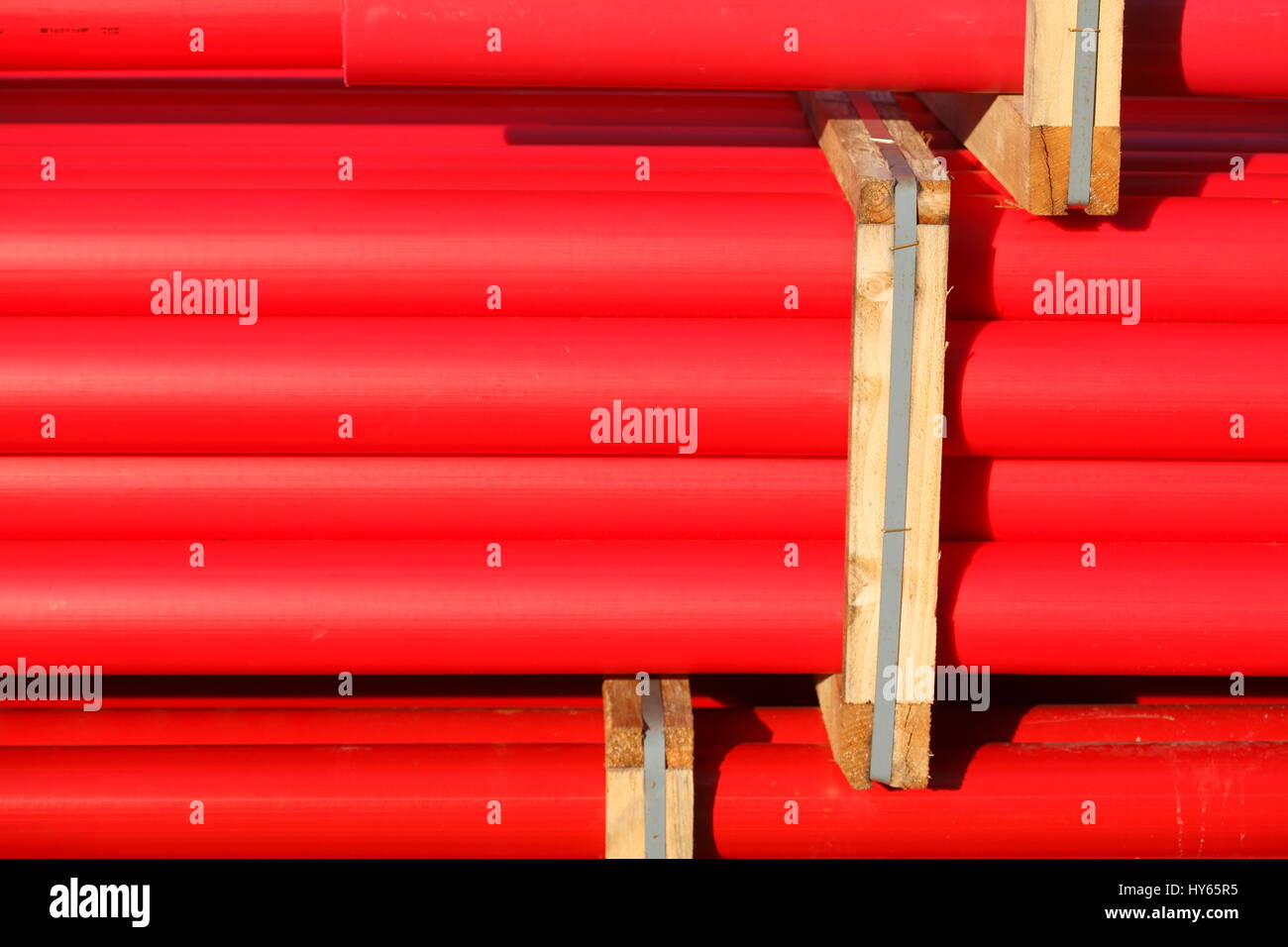 red plastic pipes Stock Photo - Alamy