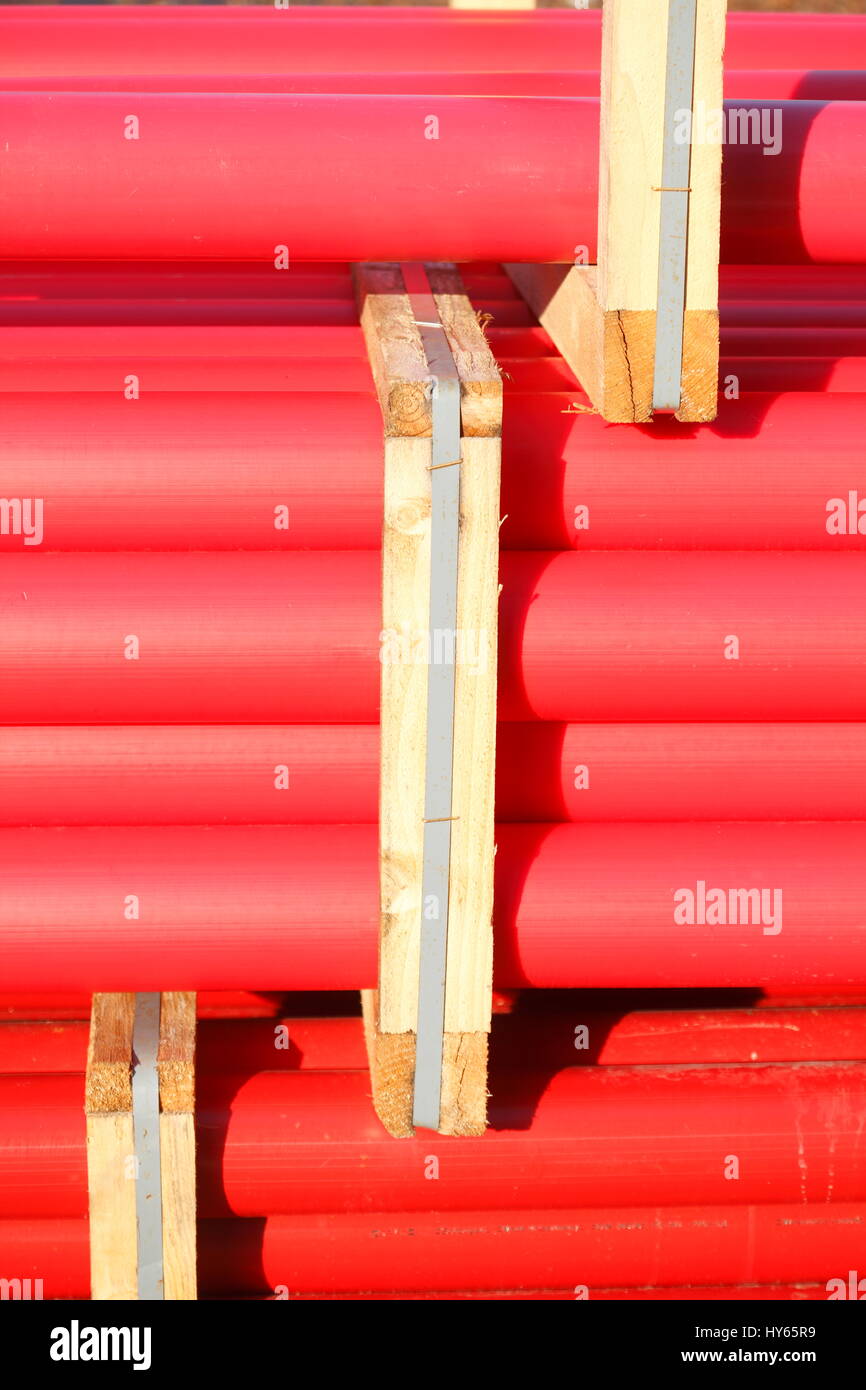 red plastic pipes Stock Photo - Alamy
