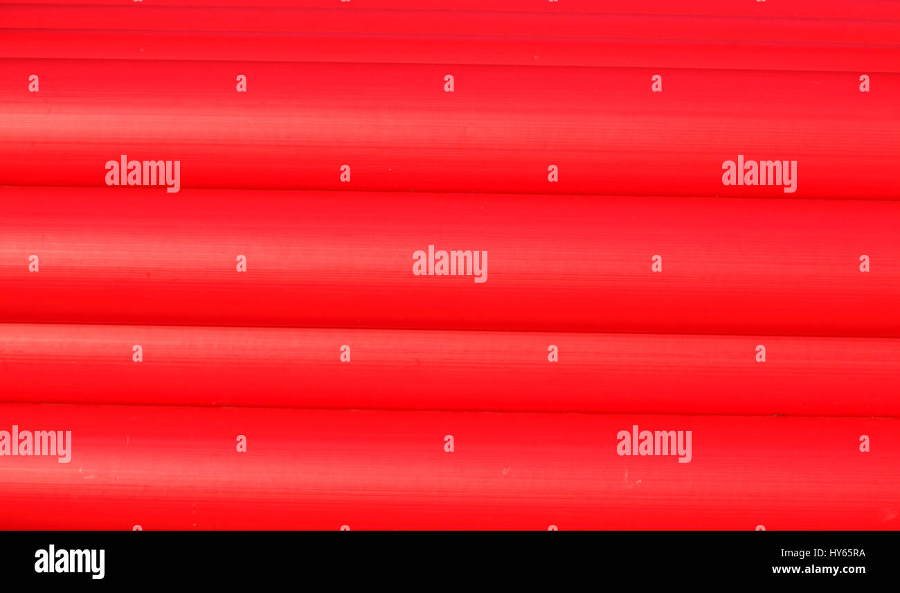 red plastic pipes Stock Photo - Alamy