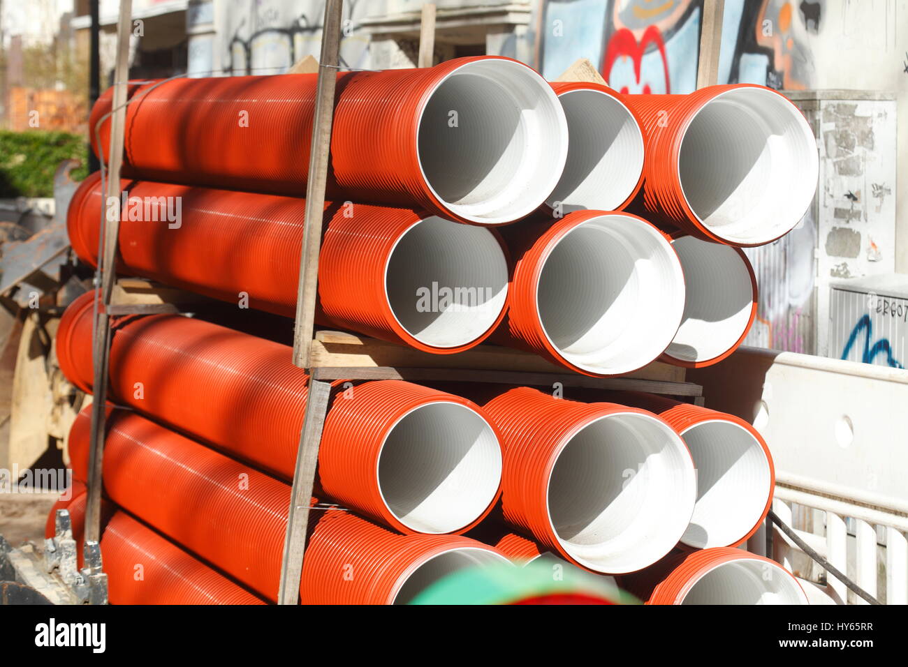 red plastic pipes Stock Photo - Alamy
