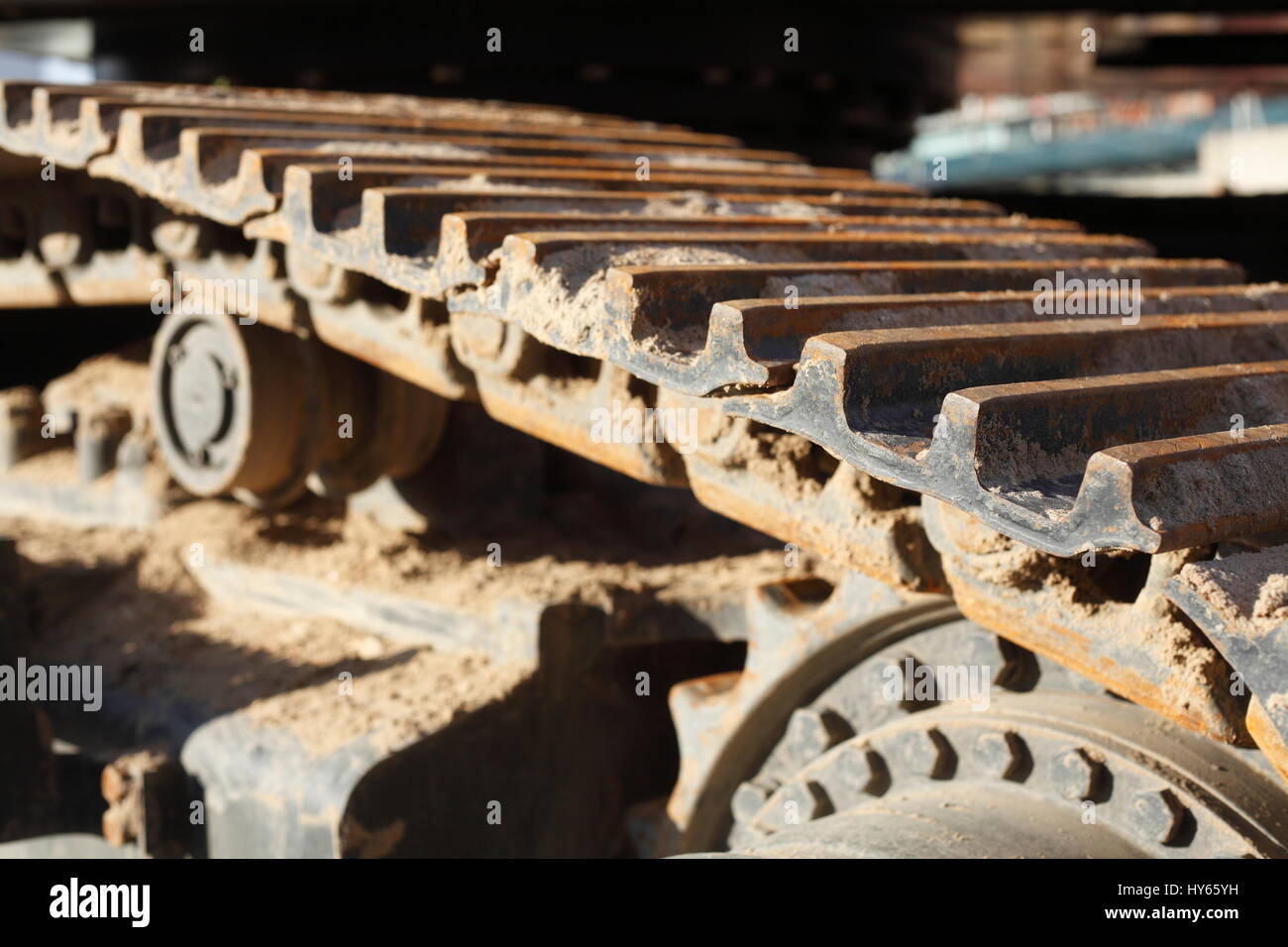 Chain Weels of an Excavator in the Sand Stock Photo - Alamy