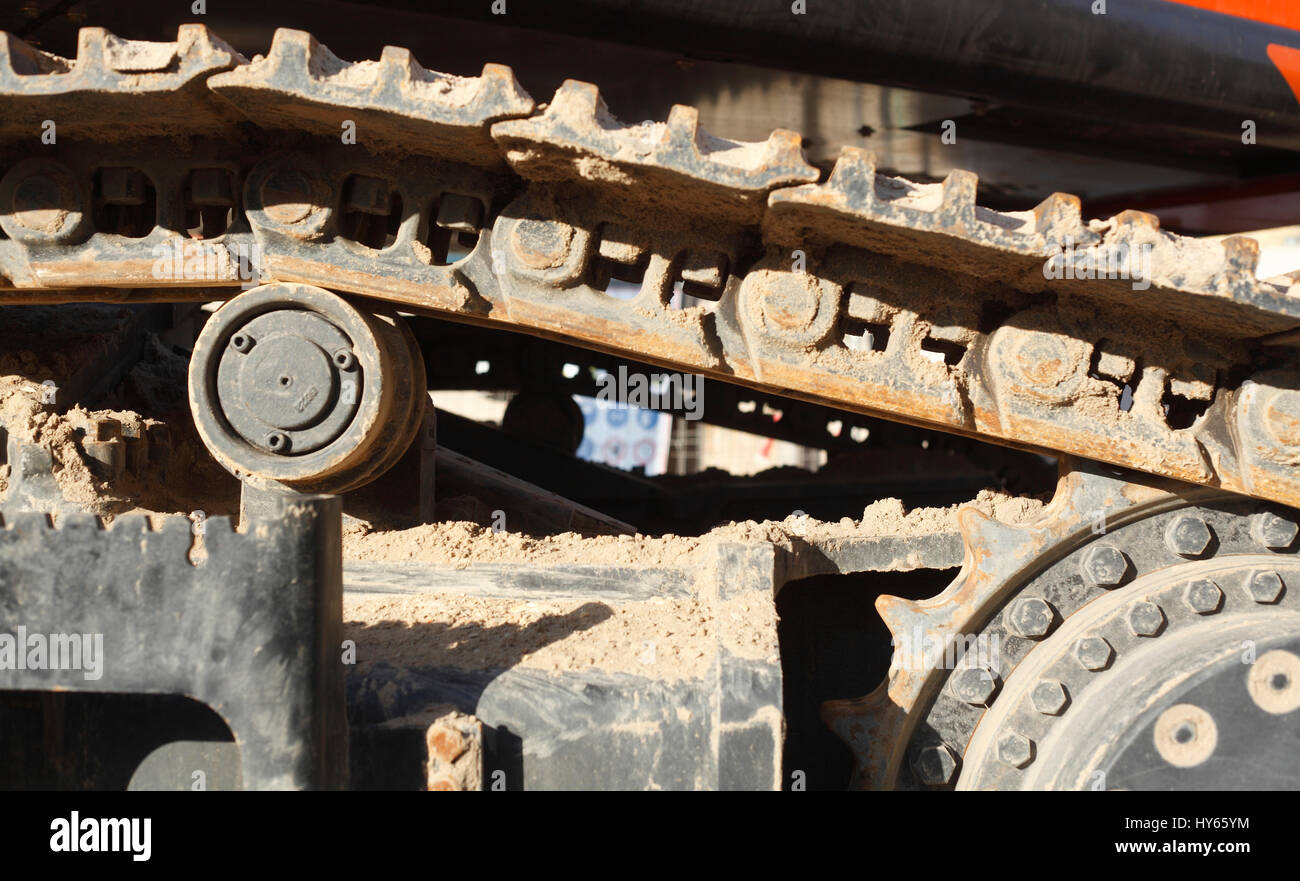 Chain Weels of an Excavator in the Sand Stock Photo - Alamy