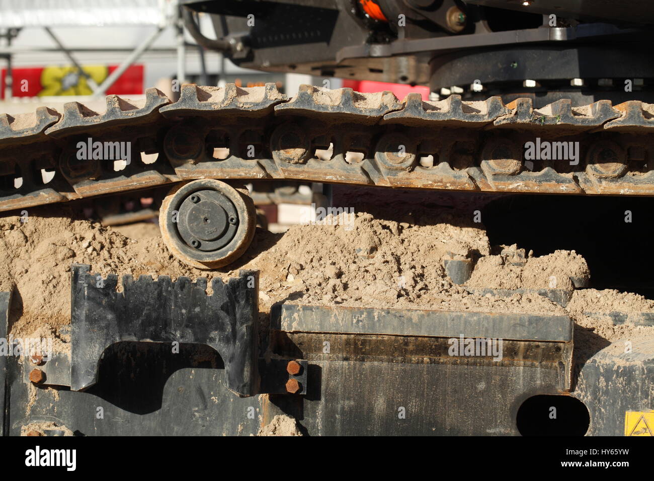 Chain Weels of an Excavator in the Sand Stock Photo - Alamy
