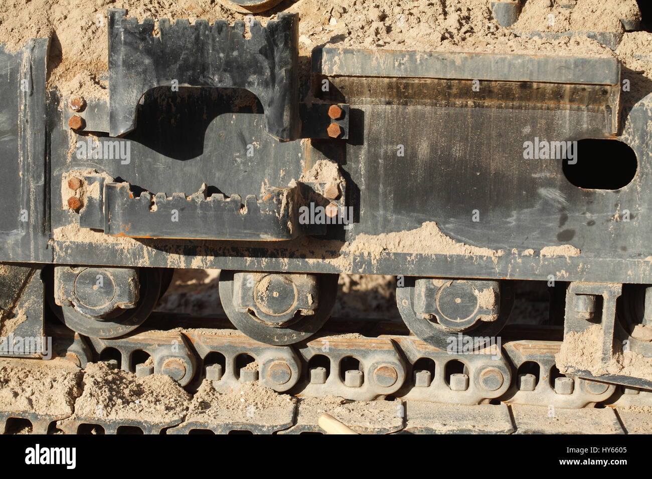 Chain Weels of an Excavator in the Sand Stock Photo - Alamy