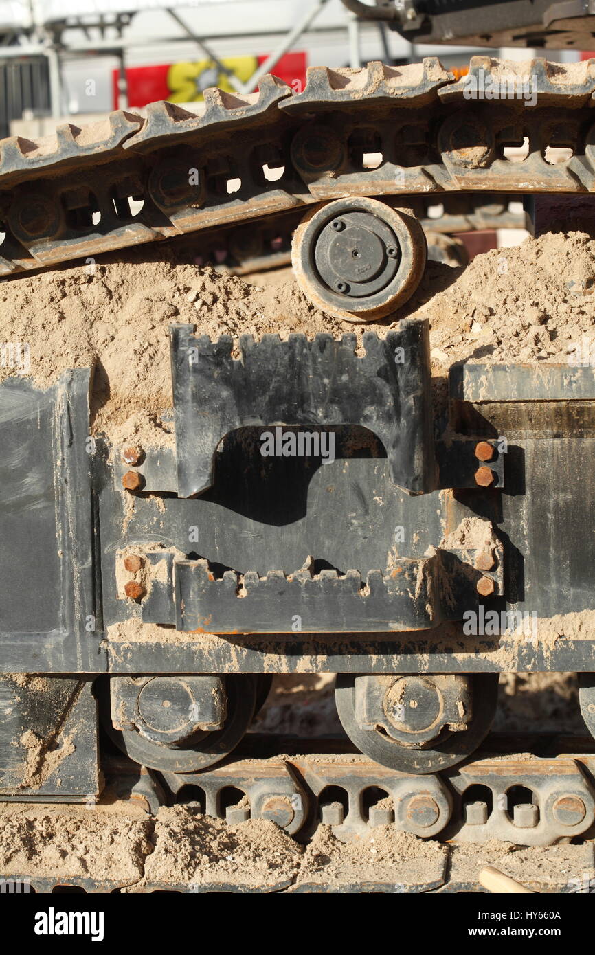 Chain Weels of an Excavator in the Sand Stock Photo - Alamy