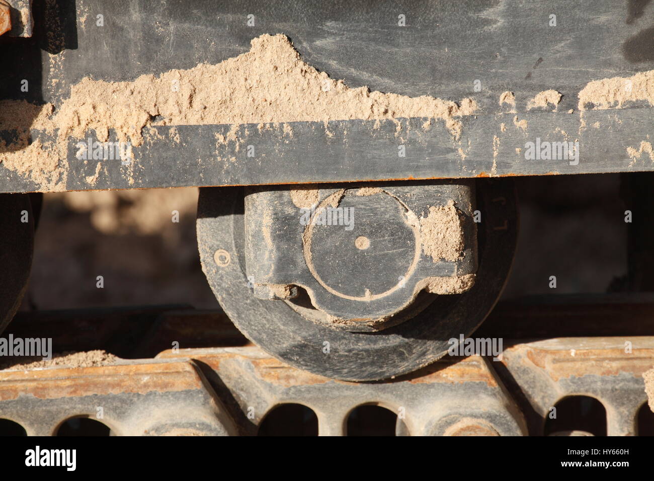 Chain Weels of an Excavator in the Sand Stock Photo - Alamy