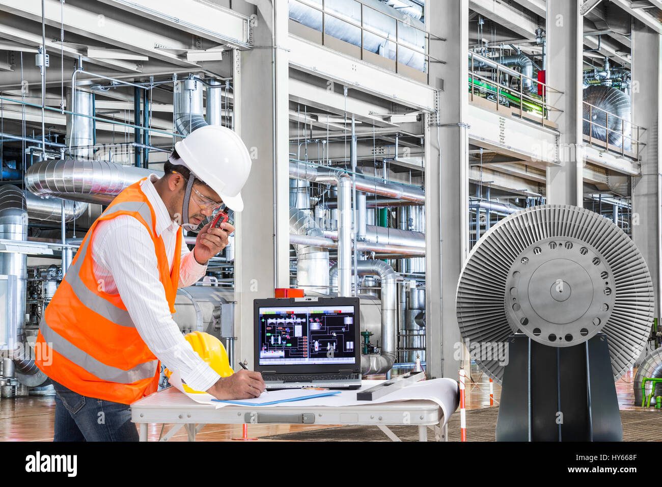 Engineer using laptop computer in thermal power plant factory Stock ...
