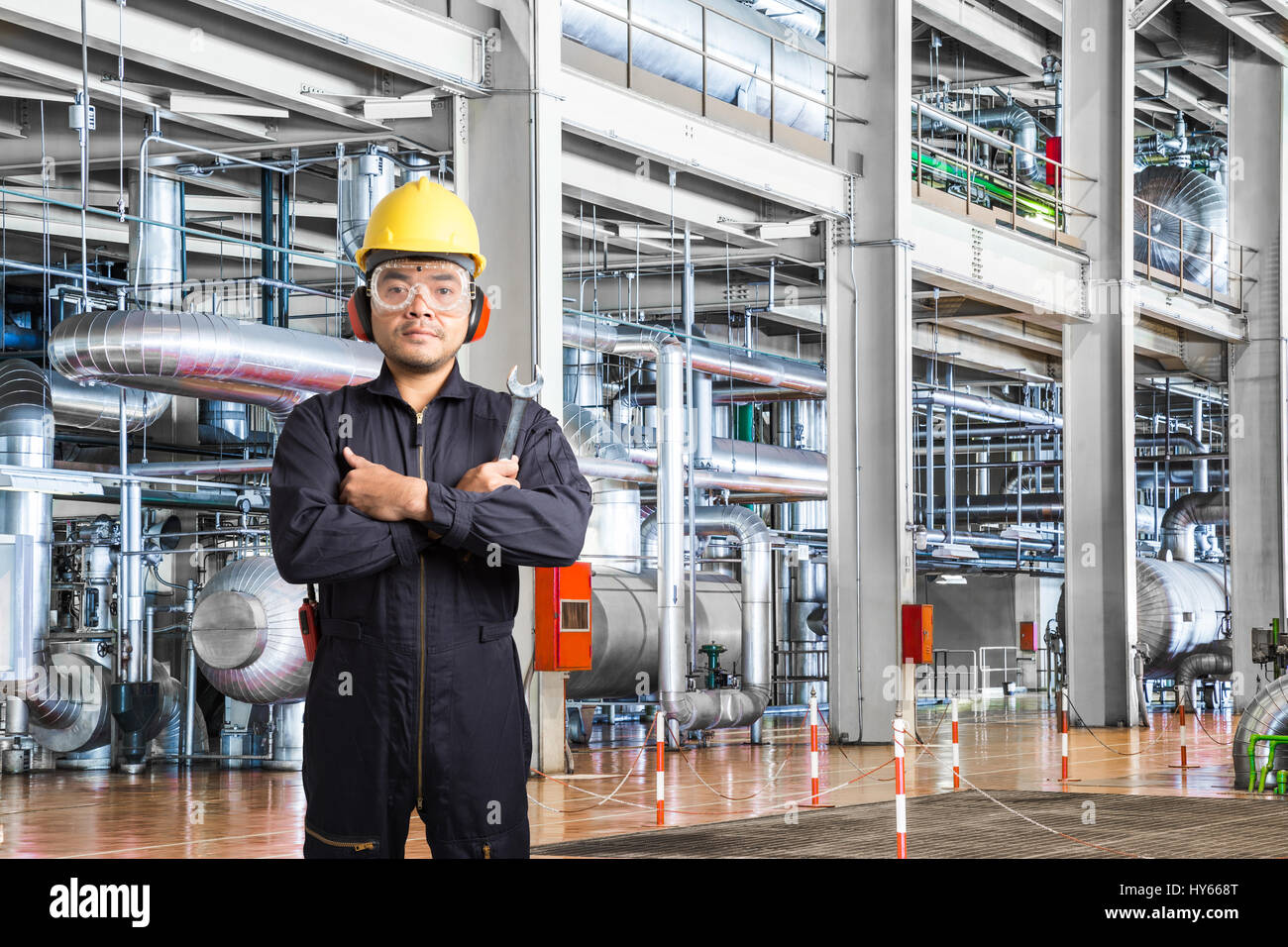 Electrical engineer working at control room of modern thermal power ...