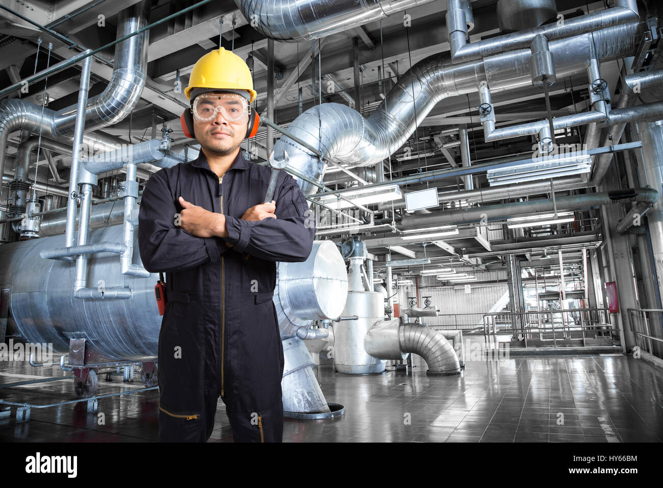 Electrical engineer working at control room of modern thermal power ...