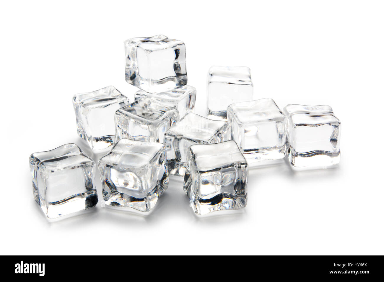 three ice cubes on white background Stock Photo - Alamy