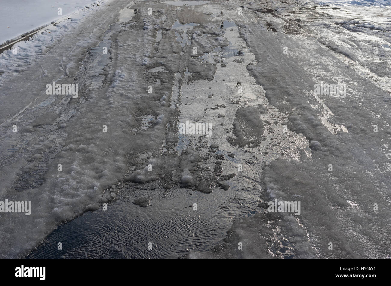 Melting ice on a road hi-res stock photography and images - Alamy