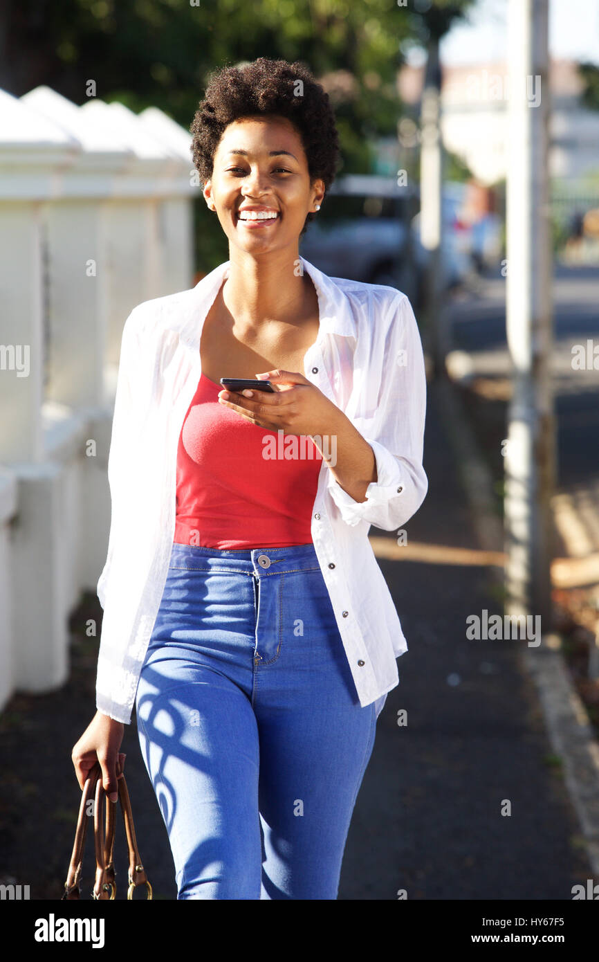 African american people walking outside hi-res stock photography and ...