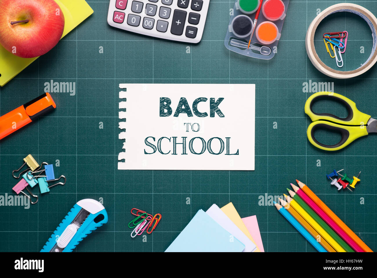 Back to school supplies. Books and chalkboard Stock Photo - Alamy