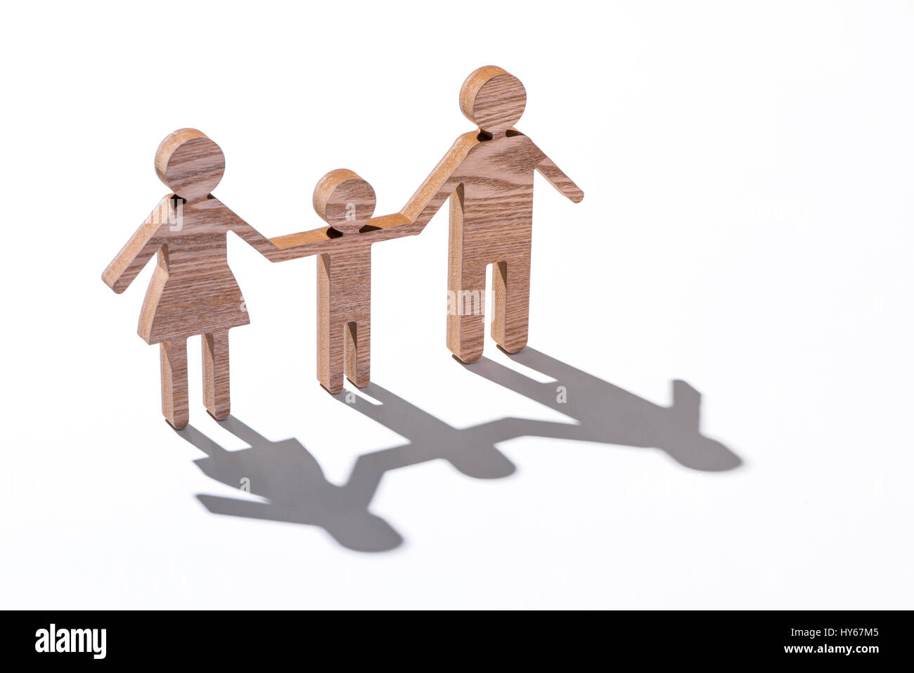 Family figure wooden modelling isolated on white with shadow Stock ...