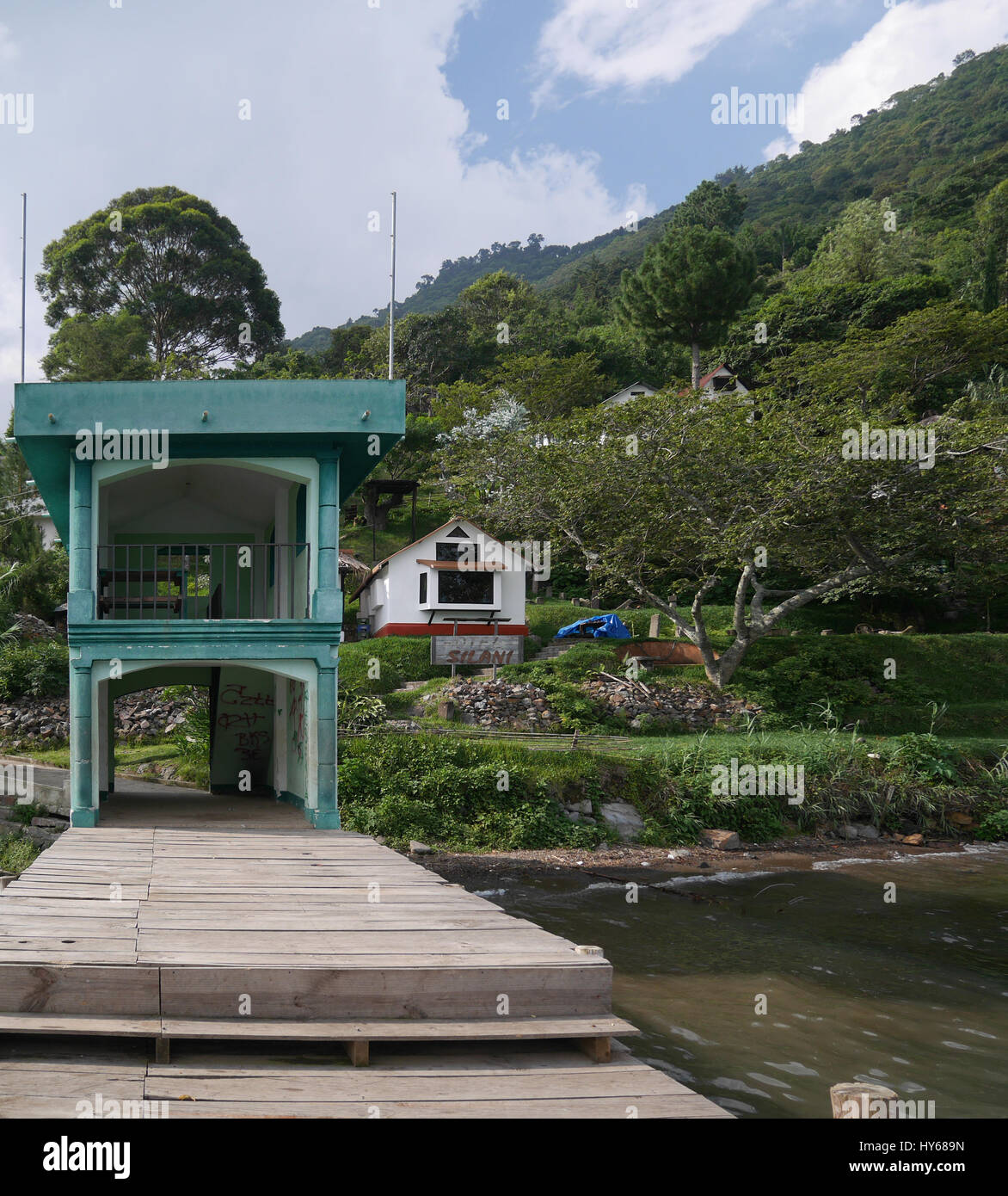 Small wooden handmade harbor for boats port Stock Photo - Alamy