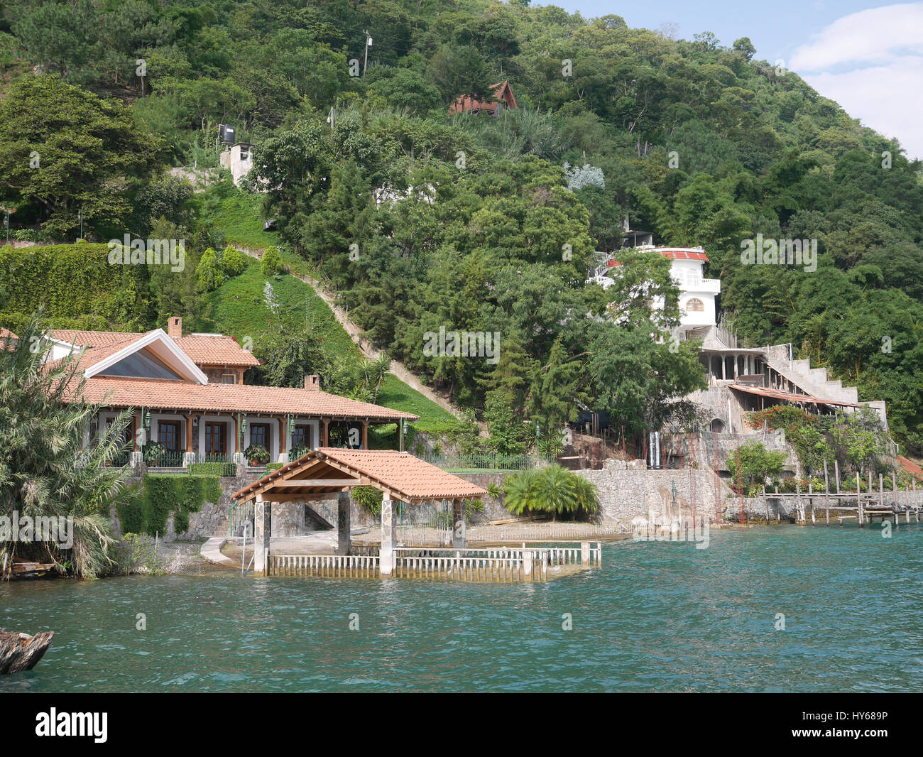 Small wooden handmade harbor for boats port Stock Photo - Alamy