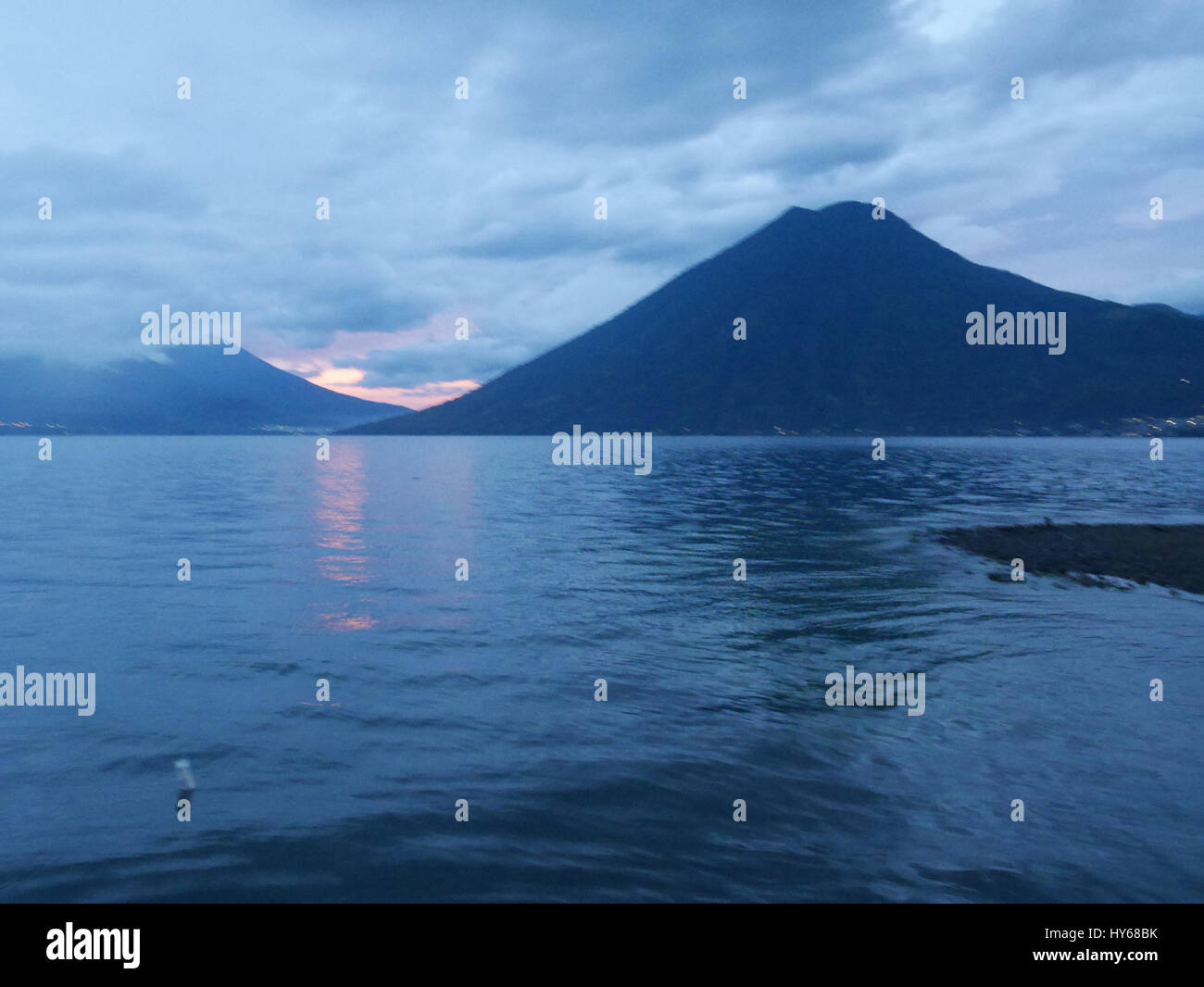 Volcán Atitlán is a large, conical, active stratovolcano adjacent to ...