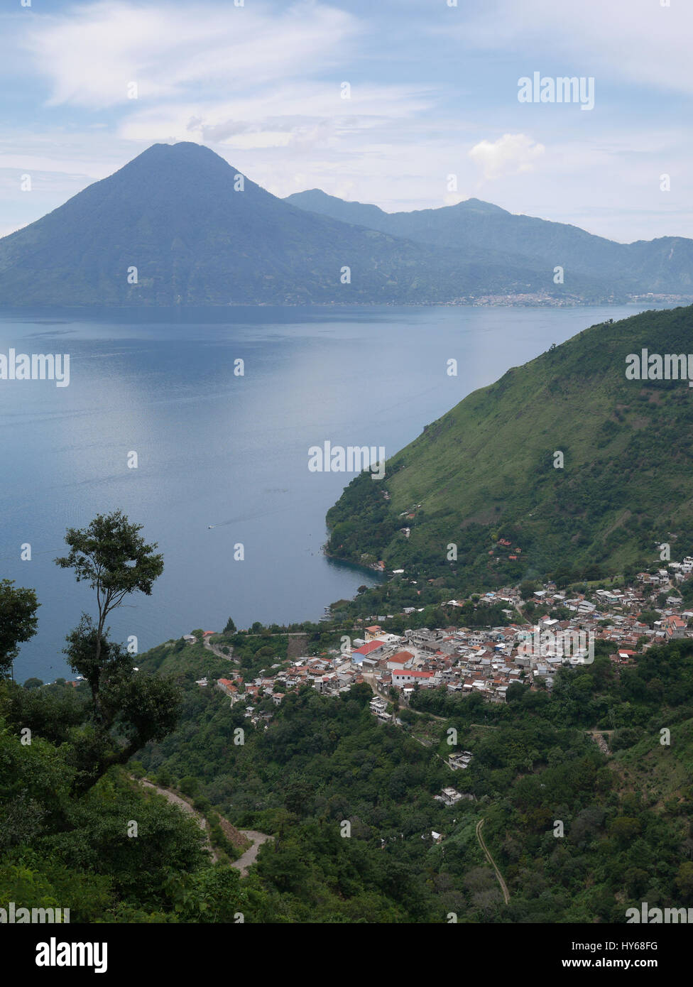Lake Atitlán is a body of water in a massive volcanic crater in ...