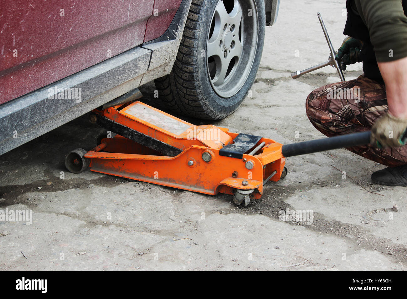 installation of passenger car wheel and replacement on spring tire in ...