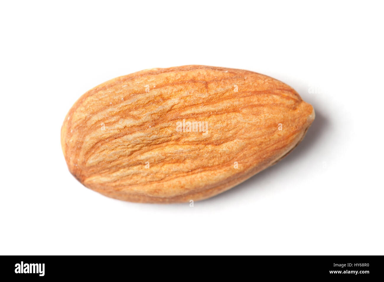 Single almond isolated on white background Stock Photo - Alamy
