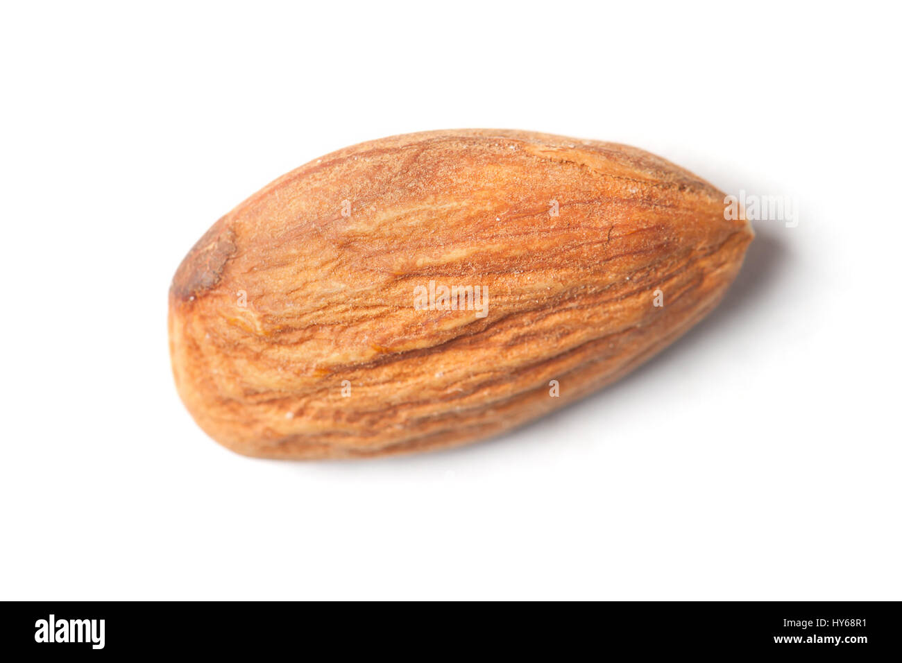 Single almond isolated on white background Stock Photo - Alamy