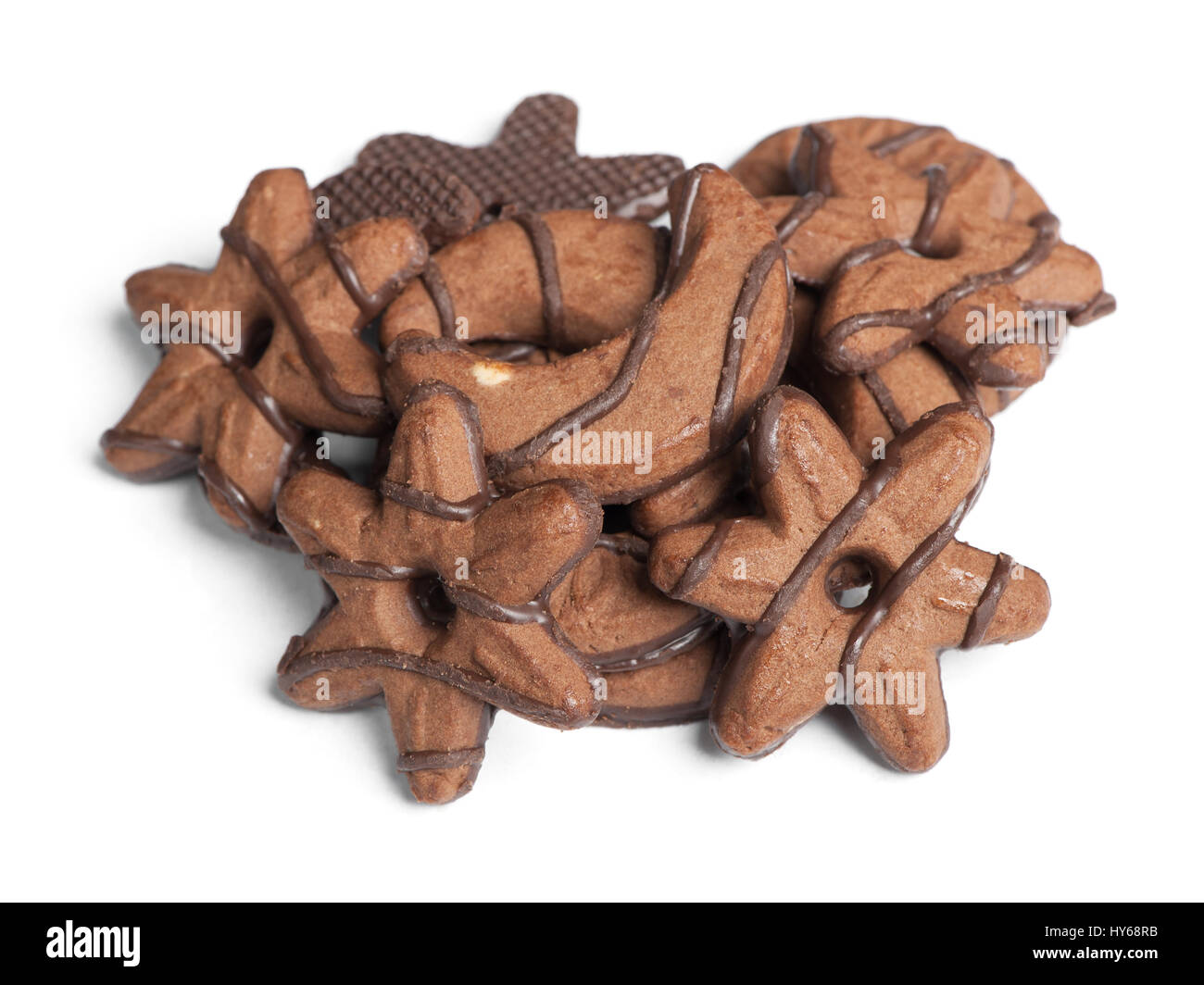 Heap of chocolate cookies in different shape isolated on white ...