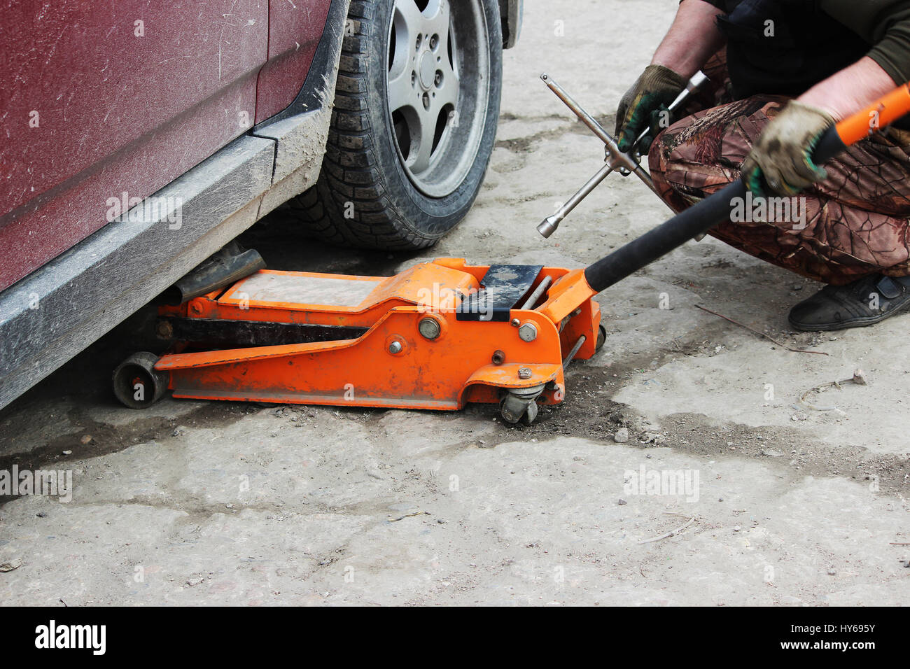 installation of passenger car wheel and replacement on spring tire in ...