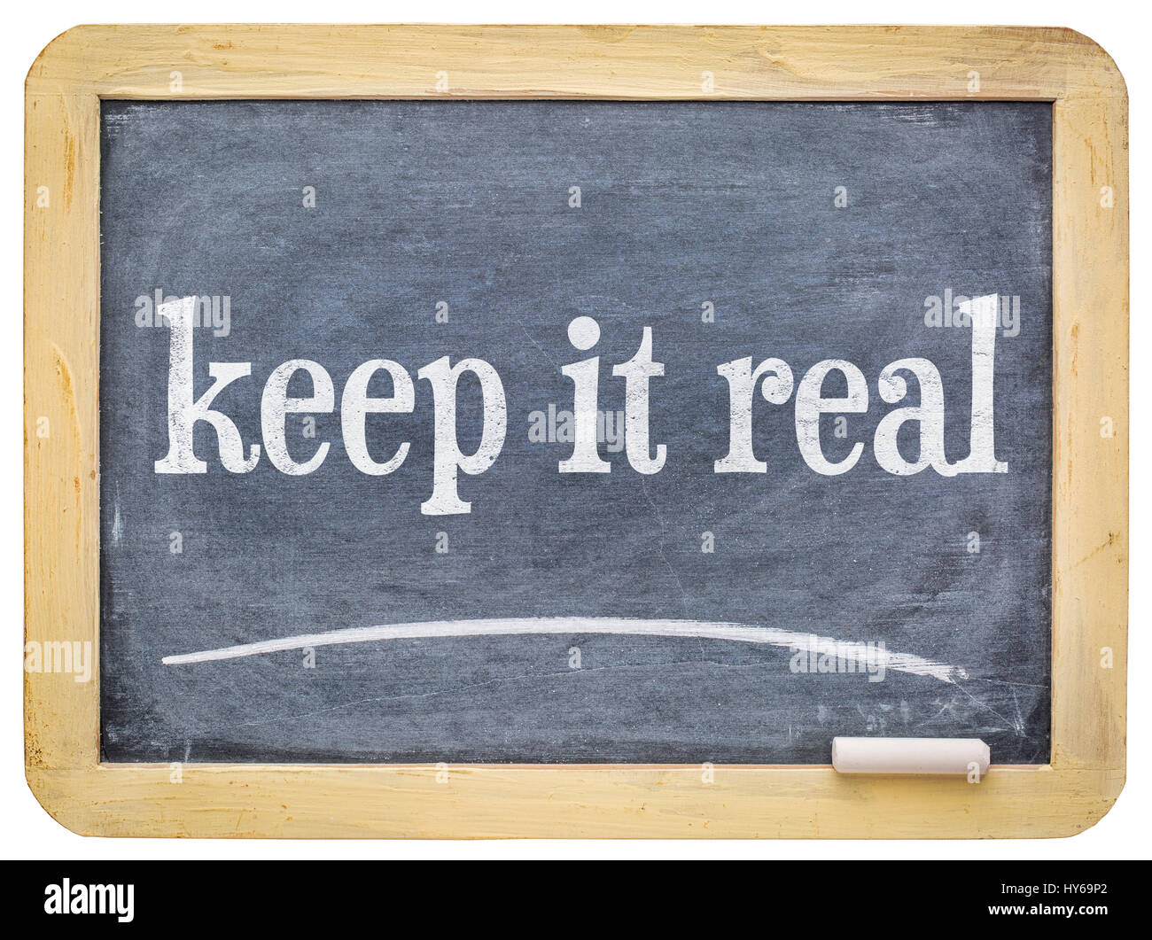 Keep it real text on a slate blackboard with chalk isolated with a ...