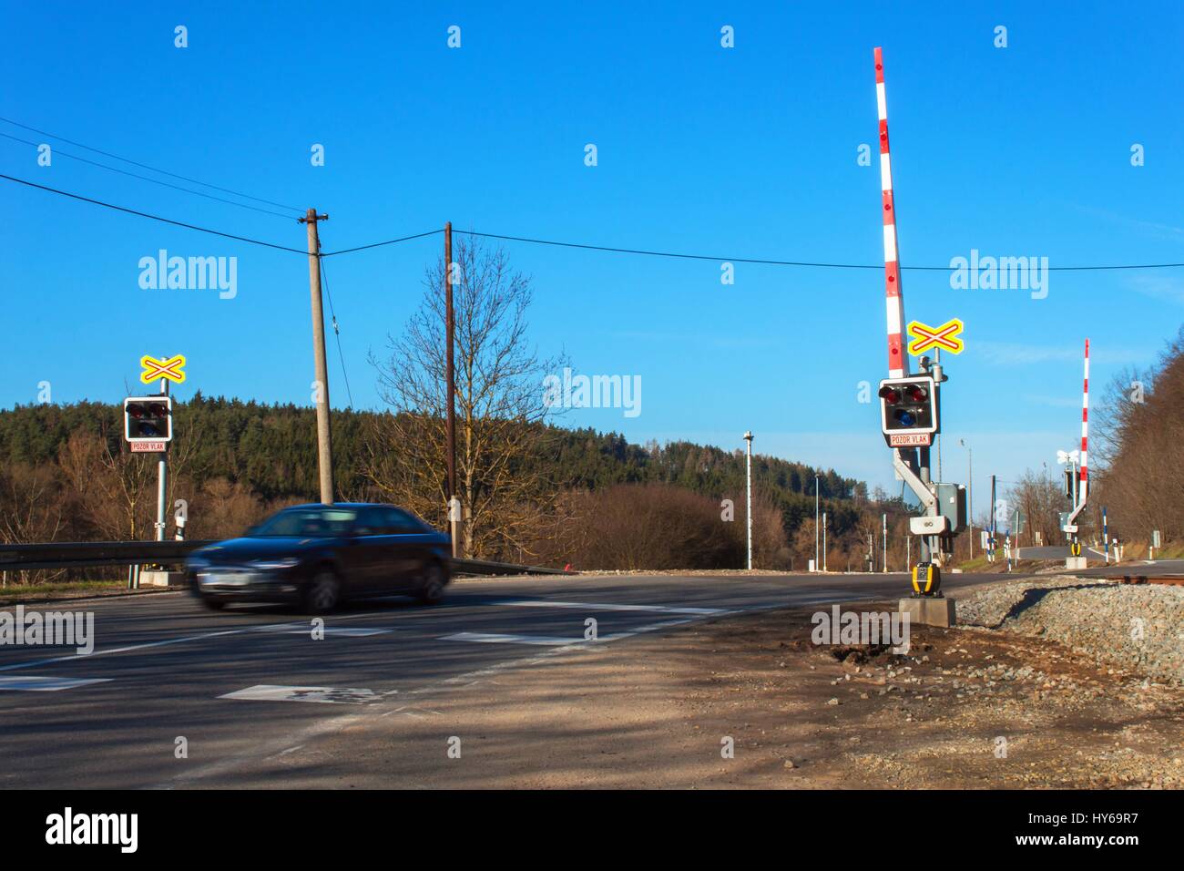 Railway crossing in the Czech Republic. Road crossing over the tracks ...